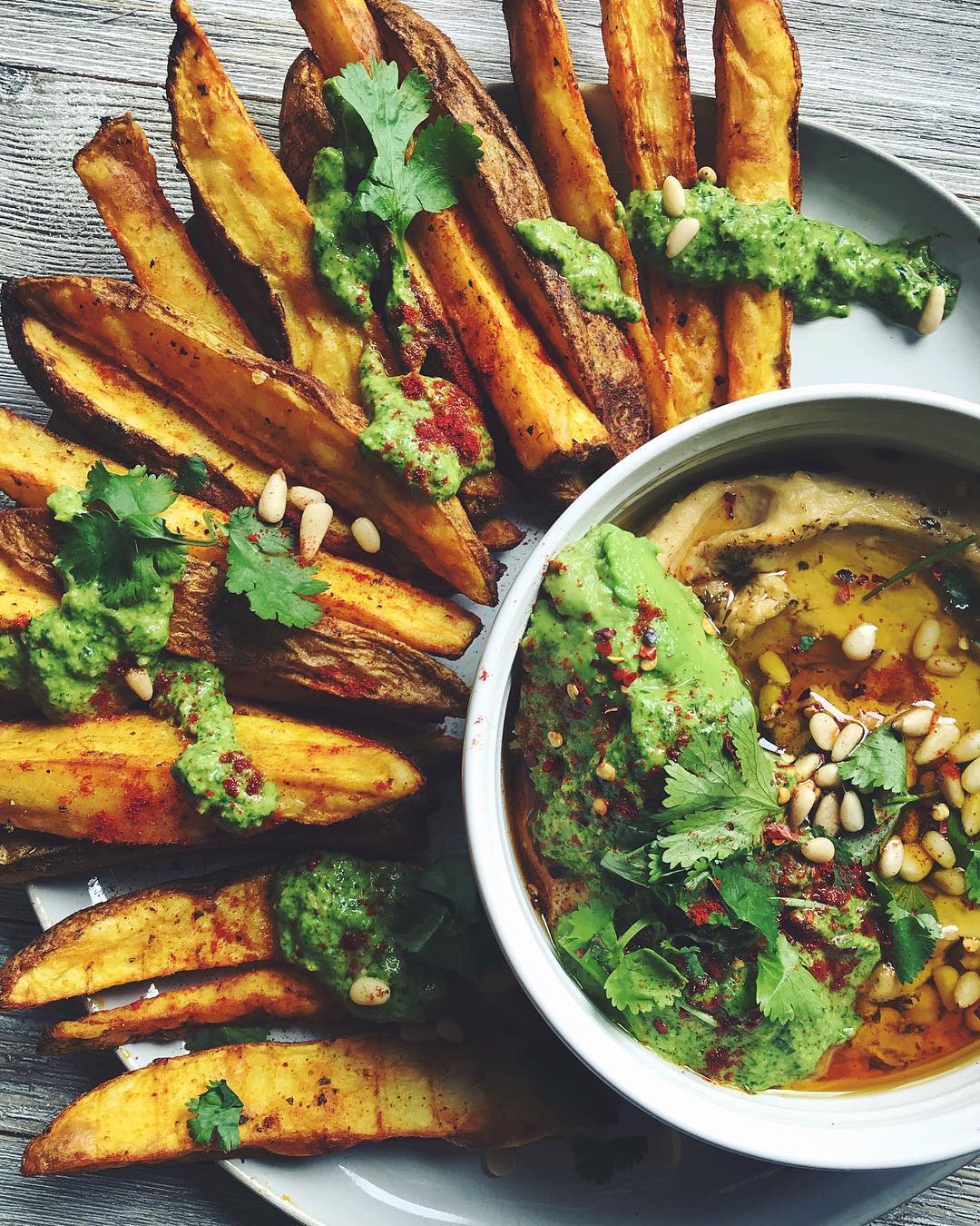 Baked Fries with Spicy Chimichurri and Hummus Recipe | The Feedfeed