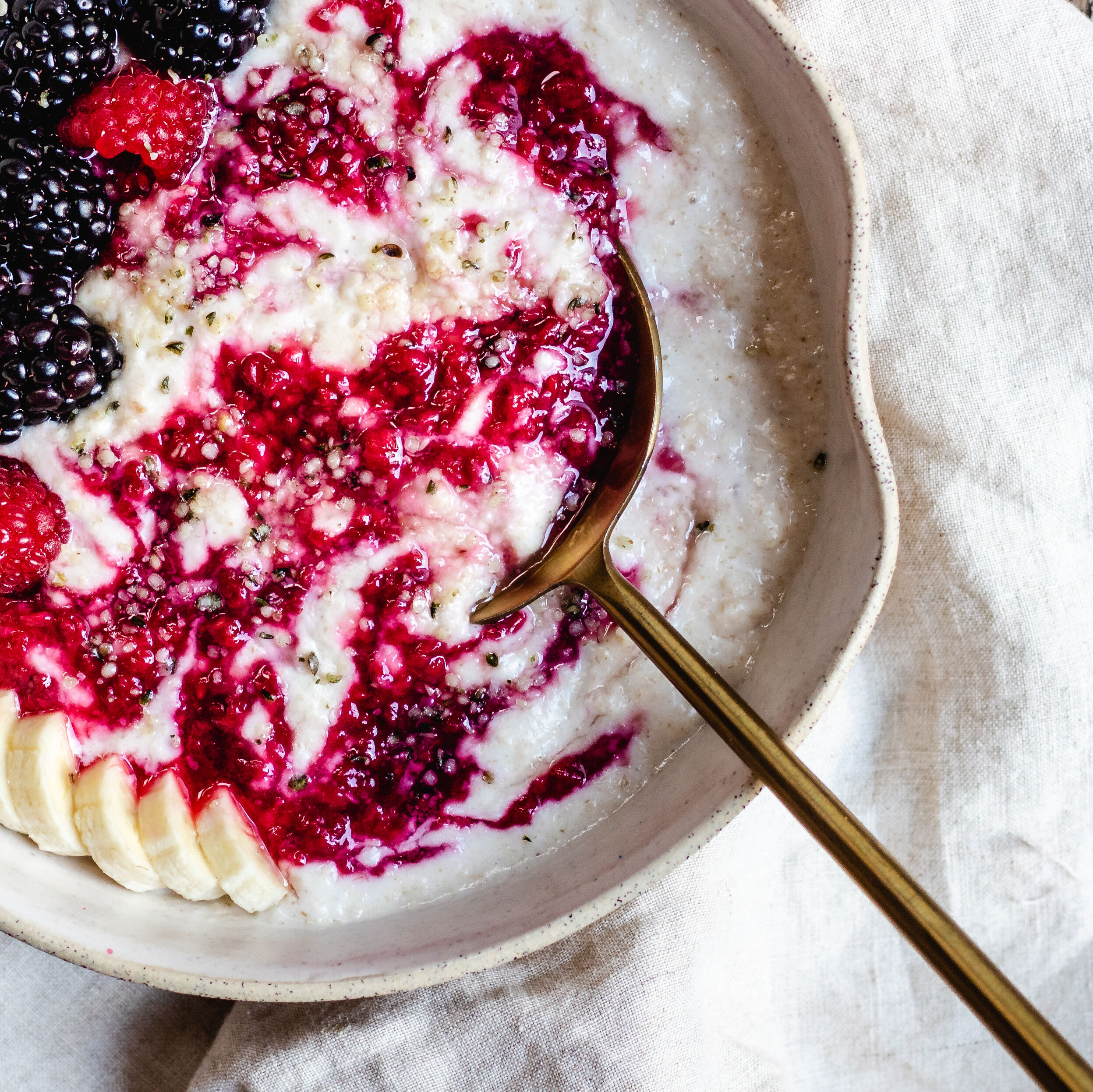 Creamy Gluten Free Cauliflower Oats with Stewed Raspberries, Banana and ...