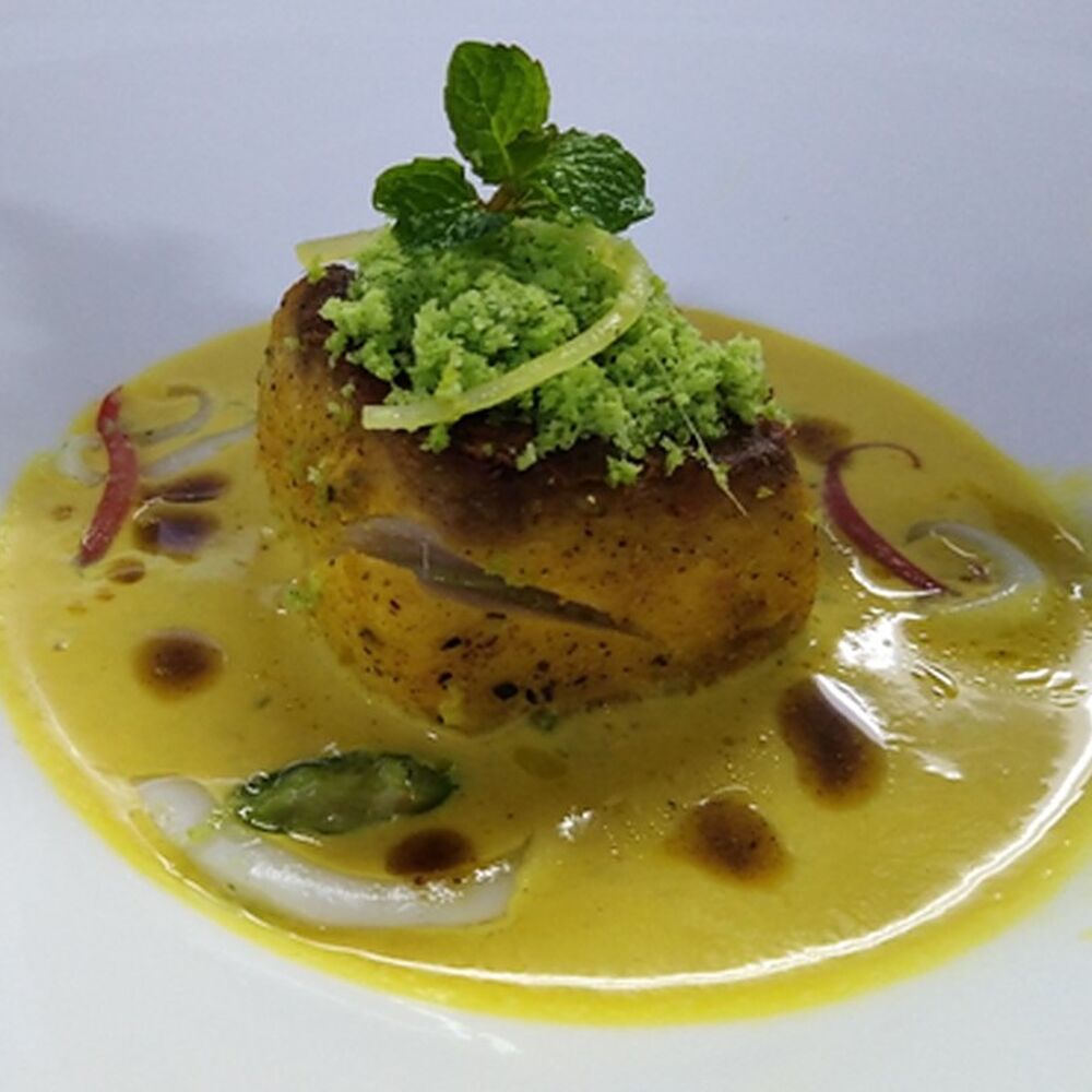 Crispy skin Modha fish, Curry gravy, Young coconut and Chilli salad ...